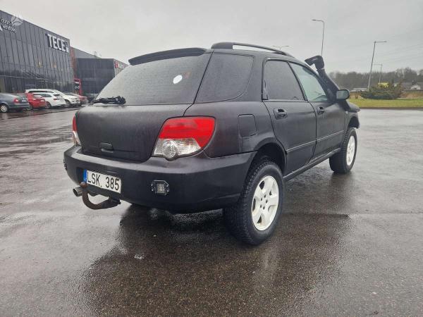 Black Subaru Impreza 2004 in Kaunas, with an engine capacity of 2.00 L and mileage of 138 thousand km for 3450 €, photo 5 on AUTOMOTO.COM.LV