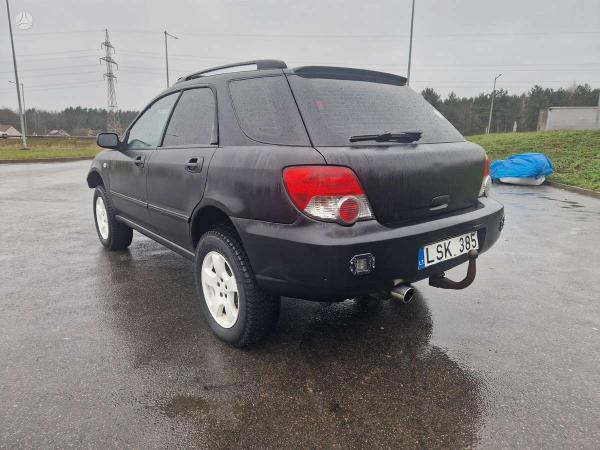 Black Subaru Impreza 2004 in Kaunas, with an engine capacity of 2.00 L and mileage of 138 thousand km for 3450 €, photo 7 on AUTOMOTO.COM.LV