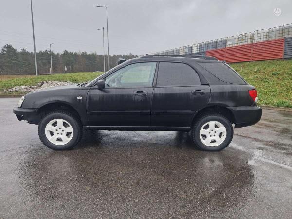 Black Subaru Impreza 2004 in Kaunas, with an engine capacity of 2.00 L and mileage of 138 thousand km for 3450 €, photo 8 on AUTOMOTO.COM.LV