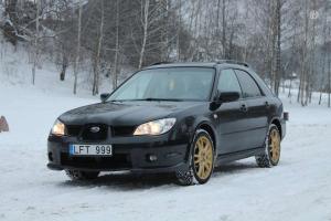 Melns Subaru Impreza 2005 Viļņa, ar dzinēja tilpumu 1.99 L un nobraukumu 330 tūkst. km par 2800 €, foto  vietnē AUTOMOTO.COM.LV