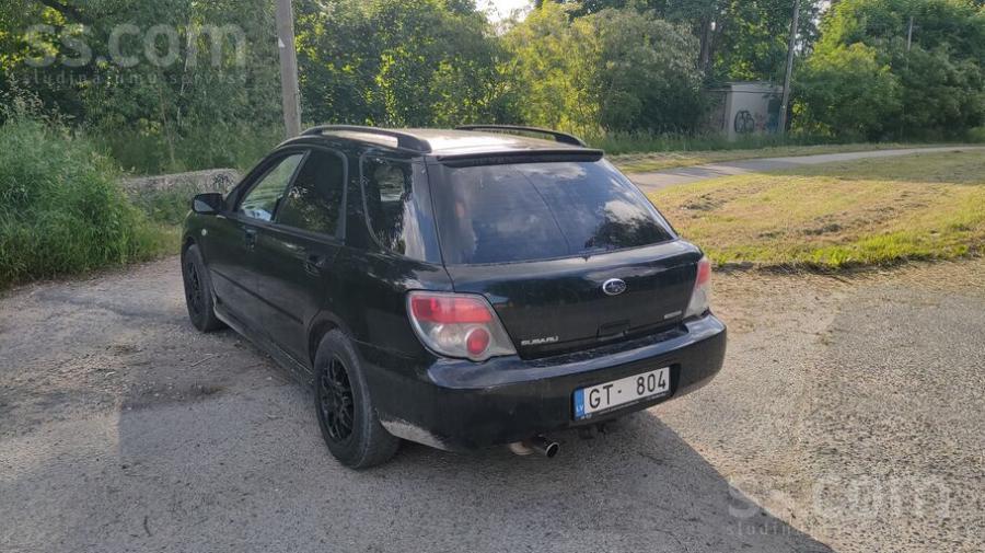 Melns Subaru Impreza 2006 Rīga, ar dzinēja tilpumu 2.00 L un nobraukumu 308 tūkst. km par 1800 €, foto 5 vietnē AUTOMOTO.COM.LV