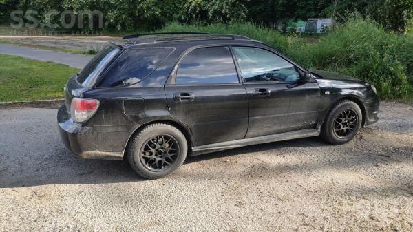 Melns Subaru Impreza 2006 Rīga, ar dzinēja tilpumu 2.00 L un nobraukumu 308 tūkst. km par 1600 €, foto 2 vietnē AUTOMOTO.COM.LV