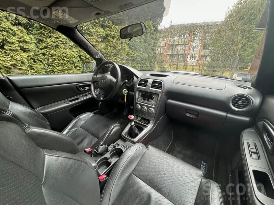 Melns Subaru Impreza 2006 Rīga, ar dzinēja tilpumu 2.50 L un nobraukumu 210 tūkst. km par 17000 €, foto 11 vietnē AUTOMOTO.COM.LV