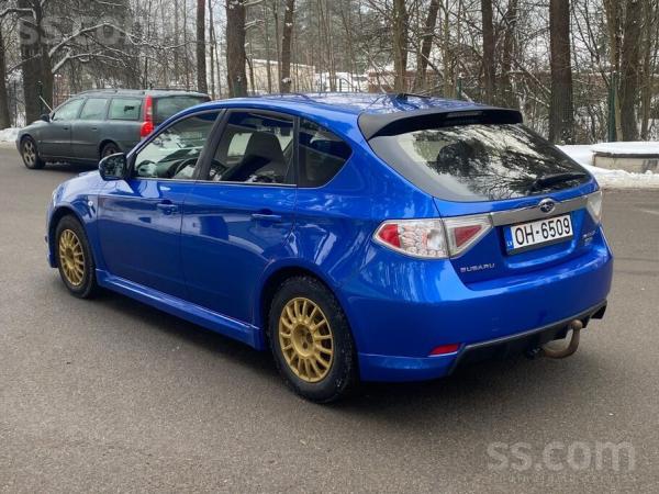 Blue Subaru Impreza 2006 in Riga, with an engine capacity of 2.00 L and mileage of 0 thousand km for 4299 €, photo 3 on AUTOMOTO.COM.LV