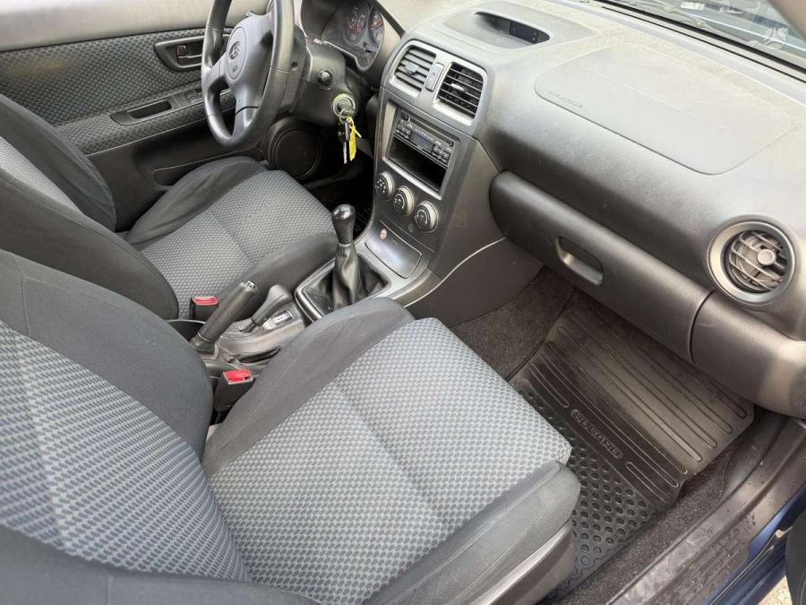 Blue Subaru Impreza 2009 in Utena, with an engine capacity of 1.50 L and mileage of 150 thousand km for 2990 €, photo 7 on AUTOMOTO.COM.LV