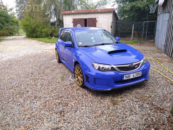 Blue Subaru Impreza 2009 in Liepaja, with an engine capacity of 2.50 L and mileage of 210 thousand km for 12990 €, photo 3 on AUTOMOTO.COM.LV
