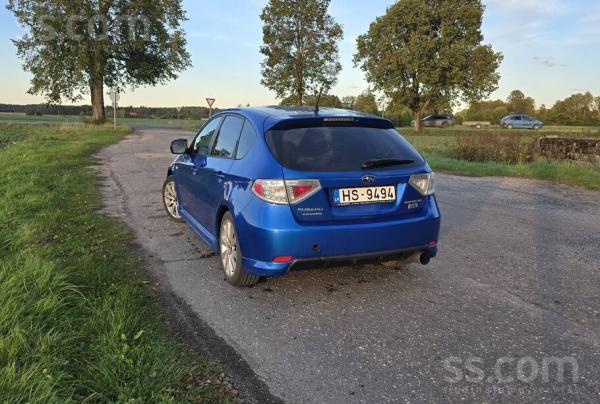 Blue Subaru Impreza 2011 in Riga, with an engine capacity of 2.00 L and mileage of 313 thousand km for 2800 €, photo 5 on AUTOMOTO.COM.LV