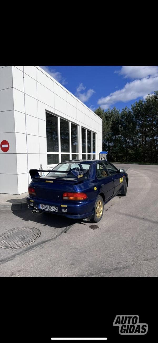 Blue Subaru Impreza 1998 in Trakai, with an engine capacity of 2.00 L and mileage of 245 thousand km for 2350 €, photo 3 on AUTOMOTO.COM.LV