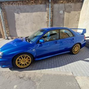 Blue Subaru Impreza 2003 in Riga, with an engine capacity of 2.00 L and mileage of 388 thousand km for 25000 €, photo  on AUTOMOTO.COM.LV