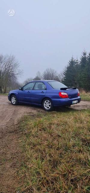 Zils Subaru Impreza 2004 Viļņa, ar dzinēja tilpumu 2.00 L un nobraukumu 318 tūkst. km par 3200 €, foto 4 vietnē AUTOMOTO.COM.LV