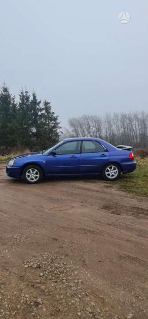 Zils Subaru Impreza 2004 Viļņa, ar dzinēja tilpumu 2.00 L un nobraukumu 318 tūkst. km par 3200 €, foto 5 vietnē AUTOMOTO.COM.LV
