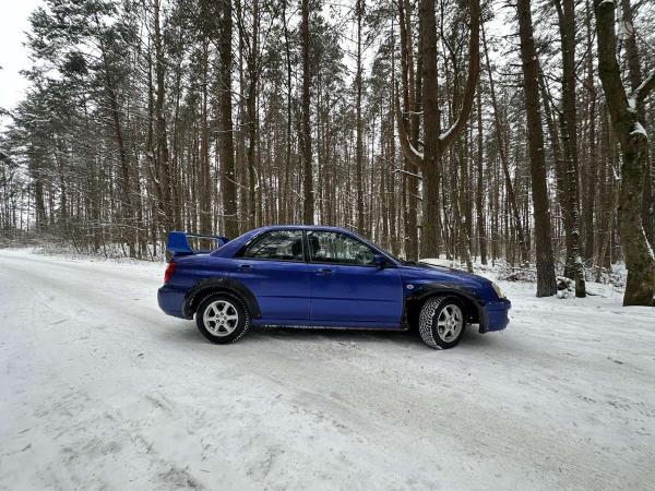 Blue Subaru Impreza 2004 in Alytus, with an engine capacity of 2.00 L and mileage of 321 thousand km for 3200 €, photo 3 on AUTOMOTO.COM.LV
