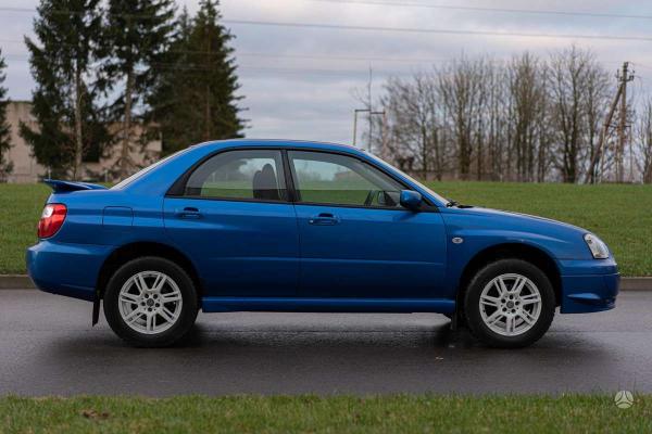 Zils Subaru Impreza 2005 Kauņa, ar dzinēja tilpumu 1.99 L un nobraukumu 171 tūkst. km par 5200 €, foto 4 vietnē AUTOMOTO.COM.LV
