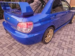 Zils Subaru Impreza 2005 Cēsis, ar dzinēja tilpumu 2.50 L un nobraukumu 175 tūkst. km par 13000 €, foto 4 vietnē AUTOMOTO.COM.LV