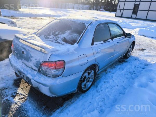 Blue Subaru Impreza 2006 in Riga, with an engine capacity of 2.00 L and mileage of 186 thousand km for 2300 €, photo 2 on AUTOMOTO.COM.LV