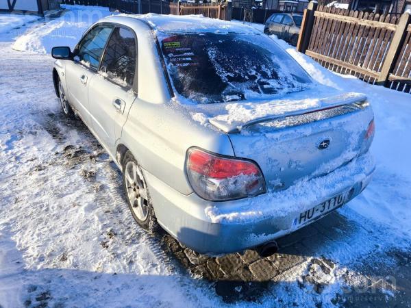 Blue Subaru Impreza 2006 in Riga, with an engine capacity of 2.00 L and mileage of 186 thousand km for 2300 €, photo 3 on AUTOMOTO.COM.LV