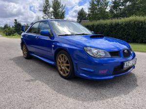 Blue Subaru Impreza 2006 in Talsi, with an engine capacity of 2.50 L and mileage of 189 thousand km for 21900 €, photo  on AUTOMOTO.COM.LV