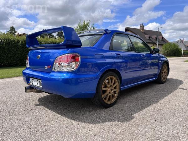 Blue Subaru Impreza 2006 in Talsi, with an engine capacity of 2.50 L and mileage of 189 thousand km for 21900 €, photo 4 on AUTOMOTO.COM.LV