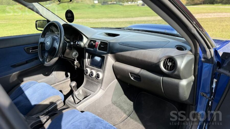 Blue Subaru Impreza 2006 in Madona, with an engine capacity of 2.50 L and mileage of 422 thousand km for 15350 €, photo 10 on AUTOMOTO.COM.LV