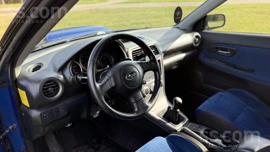 Blue Subaru Impreza 2006 in Madona, with an engine capacity of 2.50 L and mileage of 422 thousand km for 15350 €, photo 13 on AUTOMOTO.COM.LV