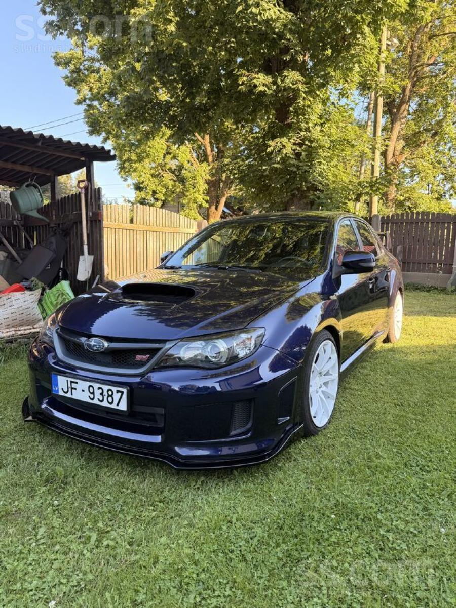 Blue Subaru Impreza 2010 in Riga, with an engine capacity of 2.50 L and mileage of 255 thousand km for 23999 €, photo 1 on AUTOMOTO.COM.LV