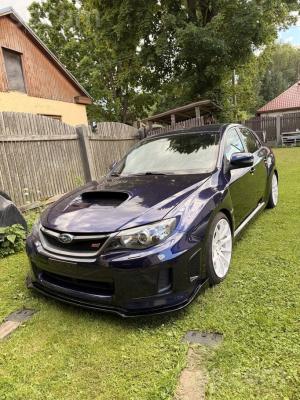 Blue Subaru Impreza 2010 in Riga, with an engine capacity of 2.50 L and mileage of 255 thousand km for 23999 €, photo 3 on AUTOMOTO.COM.LV
