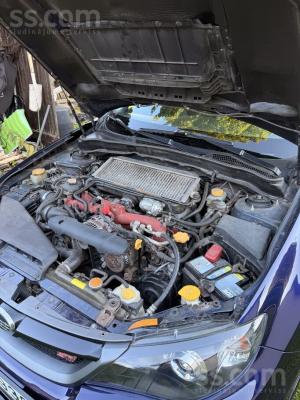 Blue Subaru Impreza 2010 in Riga, with an engine capacity of 2.50 L and mileage of 255 thousand km for 23999 €, photo 6 on AUTOMOTO.COM.LV