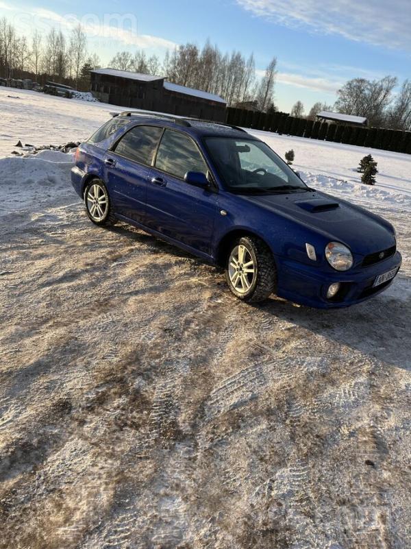 Blue Subaru Impreza 2002 in Valmiera, with an engine capacity of 2.00 L and mileage of 0 thousand km for 5800 €, photo 4 on AUTOMOTO.COM.LV
