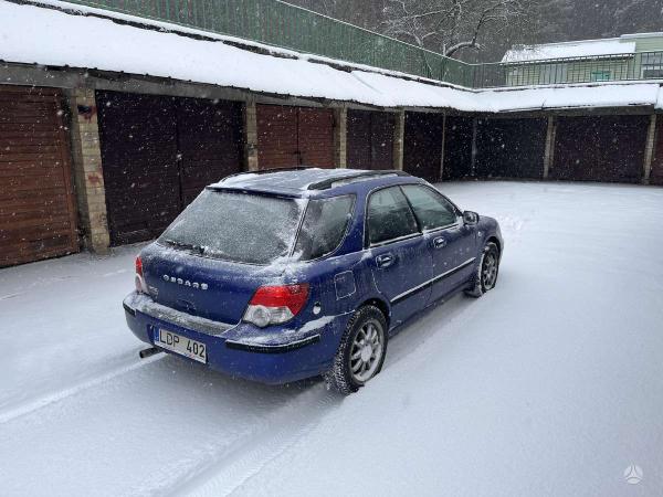 Zils Subaru Impreza 2004 Viļņa, ar dzinēja tilpumu 2.00 L un nobraukumu 450 tūkst. km par 1400 €, foto 4 vietnē AUTOMOTO.COM.LV