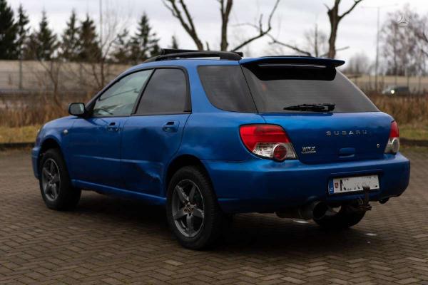 Blue Subaru Impreza 2004 in Kaisiadorys, with an engine capacity of 2.00 L and mileage of 271 thousand km for 1500 €, photo 5 on AUTOMOTO.COM.LV