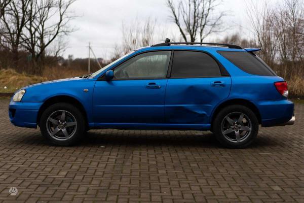 Blue Subaru Impreza 2004 in Kaisiadorys, with an engine capacity of 2.00 L and mileage of 271 thousand km for 1500 €, photo 6 on AUTOMOTO.COM.LV
