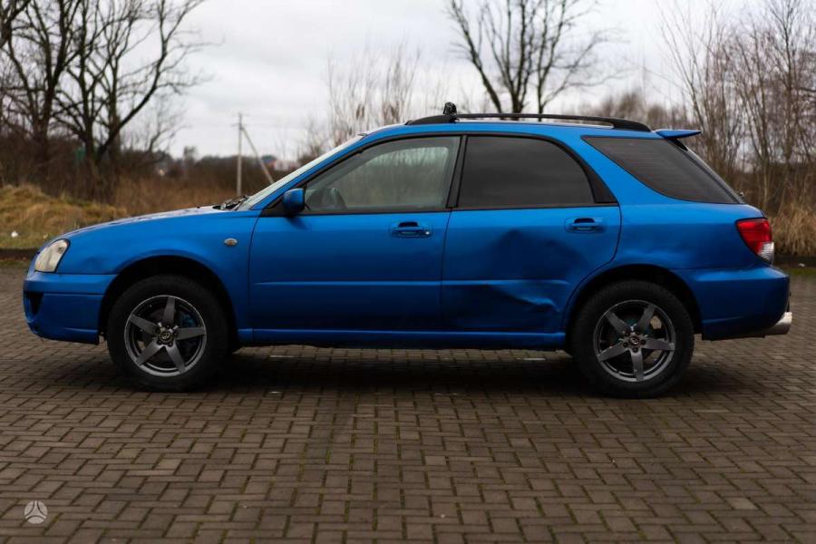 Blue Subaru Impreza 2004 in Kaisiadorys, with an engine capacity of 2.00 L and mileage of 271 thousand km for 1500 €, photo 6 on AUTOMOTO.COM.LV