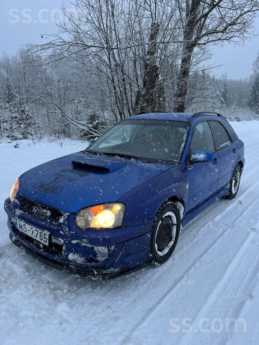 Blue Subaru Impreza 2005 in Riga, with an engine capacity of 2.00 L and mileage of 252 thousand km for 2400 €, photo 2 on AUTOMOTO.COM.LV