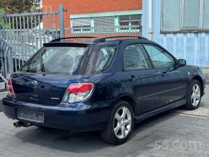 Zils Subaru Impreza 2006 Valmiera, ar dzinēja tilpumu 2.00 L un nobraukumu 182 tūkst. km par 4000 €, foto 4 vietnē AUTOMOTO.COM.LV