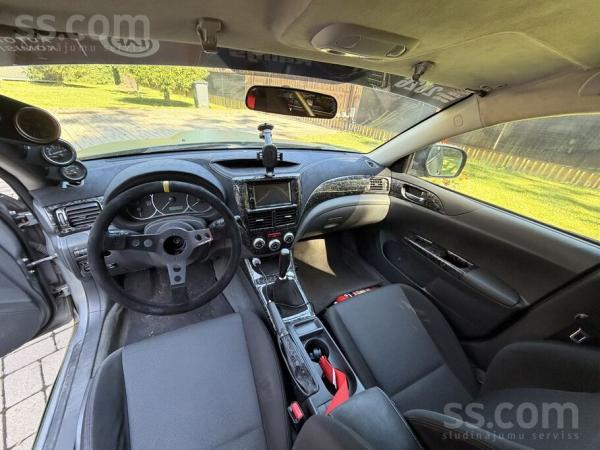 Green Subaru Impreza 2008 in Riga, with an engine capacity of 2.50 L and mileage of 191 thousand km for 9000 €, photo 6 on AUTOMOTO.COM.LV