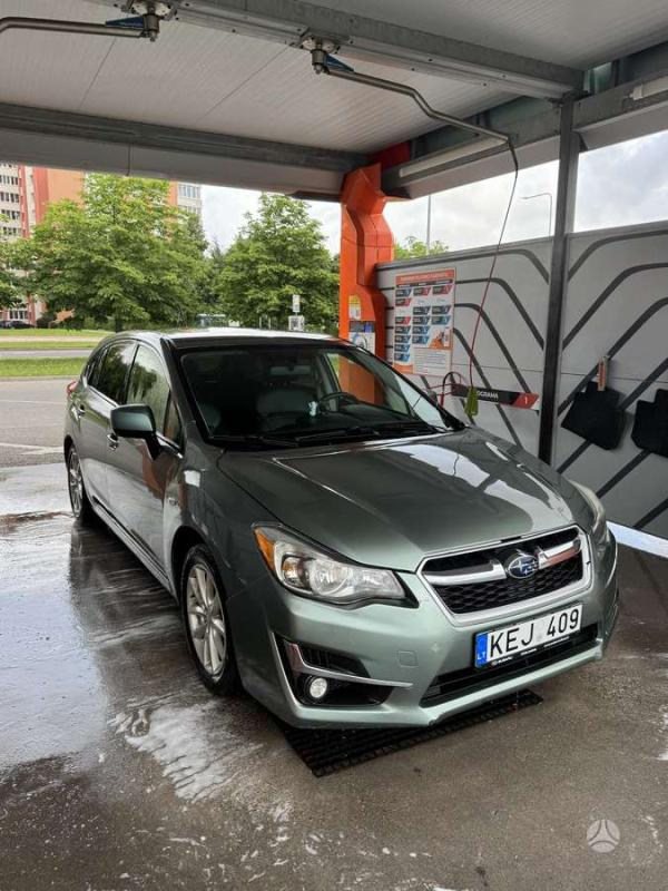 Green Subaru Impreza 2014 in Klaipeda, with an engine capacity of 2.00 L and mileage of 256 thousand km for 4400 €, photo 1 on AUTOMOTO.COM.LV