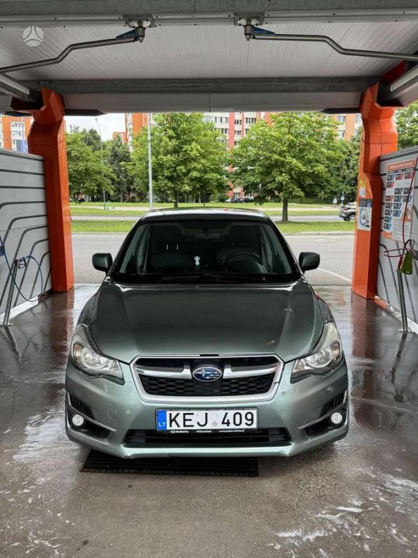 Green Subaru Impreza 2014 in Klaipeda, with an engine capacity of 2.00 L and mileage of 256 thousand km for 4400 €, photo 3 on AUTOMOTO.COM.LV