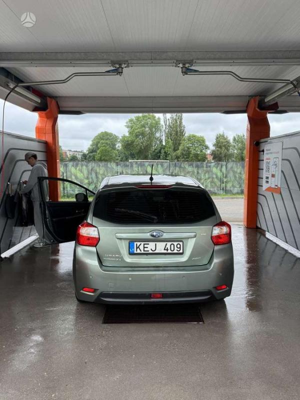 Green Subaru Impreza 2014 in Klaipeda, with an engine capacity of 2.00 L and mileage of 256 thousand km for 4400 €, photo 5 on AUTOMOTO.COM.LV