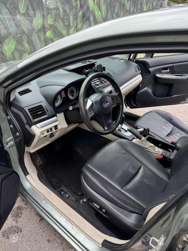 Green Subaru Impreza 2014 in Klaipeda, with an engine capacity of 2.00 L and mileage of 256 thousand km for 4400 €, photo 8 on AUTOMOTO.COM.LV