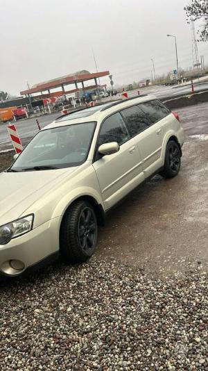 Green Subaru Impreza 2002 in Pagegiai, with an engine capacity of 2.50 L and mileage of 300 thousand km for 1700 €, photo 5 on AUTOMOTO.COM.LV