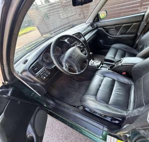 Green Subaru Impreza 2001 in Kaunas, with an engine capacity of 2.46 L and mileage of 348 thousand km for 850 €, photo 6 on AUTOMOTO.COM.LV