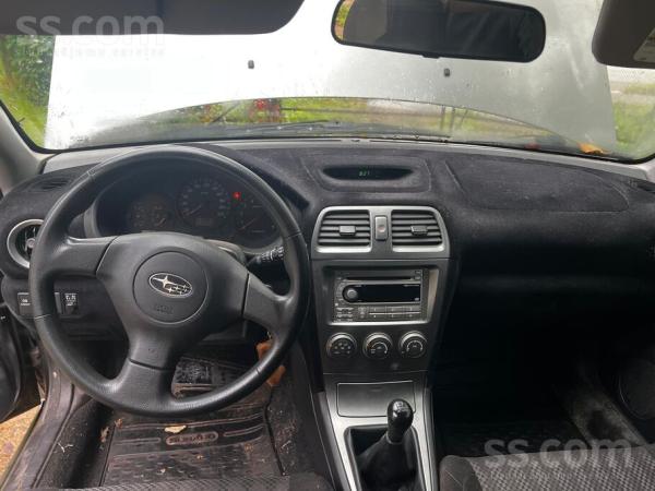 Pelēks Subaru Impreza 2007 Ogre, ar dzinēja tilpumu 1.50 L un nobraukumu 239 tūkst. km par 1350 €, foto 4 vietnē AUTOMOTO.COM.LV