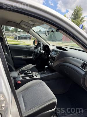 Grey Subaru Impreza 2008 in Riga, with an engine capacity of 2.00 L and mileage of 189 thousand km for 2350 €, photo 8 on AUTOMOTO.COM.LV