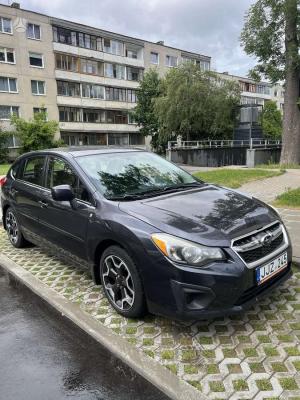Grey Subaru Impreza 2014 in Vilnius, with an engine capacity of 1.99 L and mileage of 106 thousand km for 4400 €, photo 22 on AUTOMOTO.COM.LV