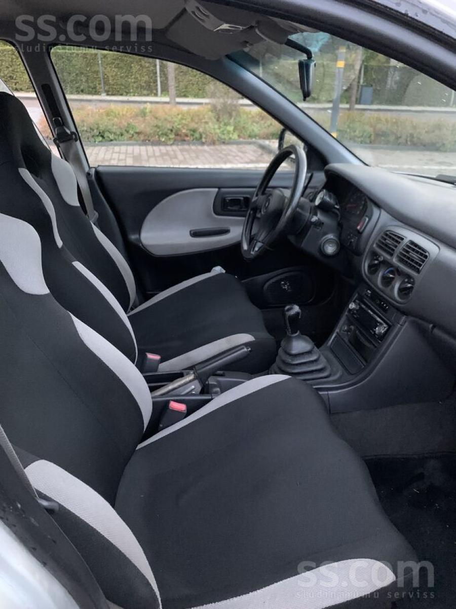 Grey Subaru Impreza 1997 in Ventspils, with an engine capacity of 2.00 L and mileage of 124 thousand km for 11500 €, photo 8 on AUTOMOTO.COM.LV