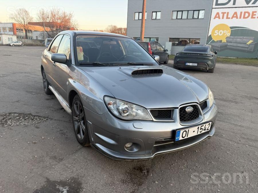 Pelēks Subaru Impreza 2006 Rīga, ar dzinēja tilpumu 2.50 L un nobraukumu 160 tūkst. km par 12500 €, foto 5 vietnē AUTOMOTO.COM.LV