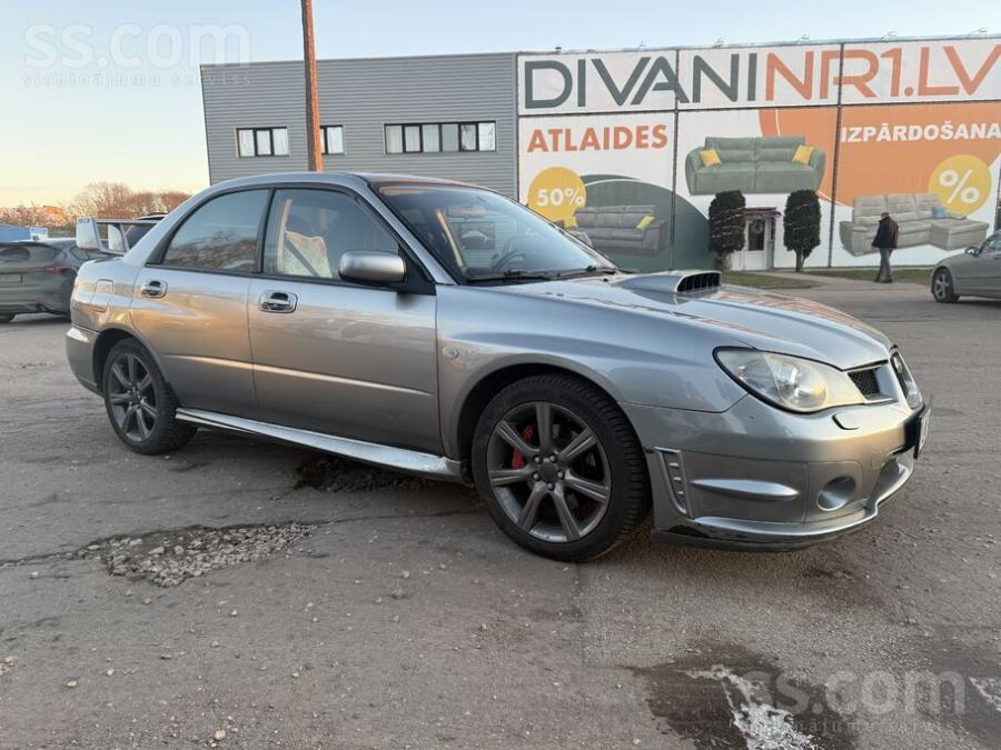 Pelēks Subaru Impreza 2006 Rīga, ar dzinēja tilpumu 2.50 L un nobraukumu 160 tūkst. km par 12500 €, foto 6 vietnē AUTOMOTO.COM.LV