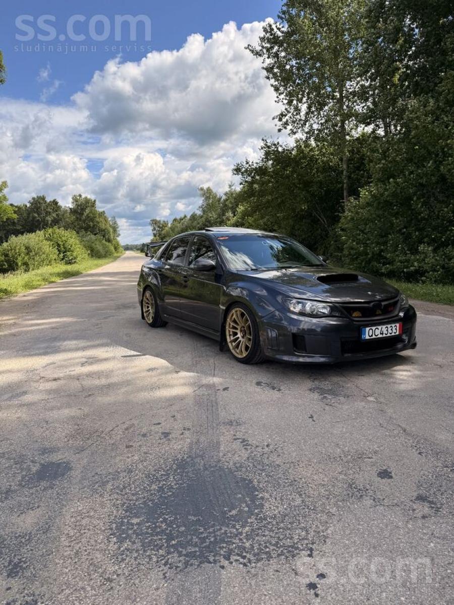 Pelēks Subaru Impreza 2011 Bauska, ar dzinēja tilpumu 2.50 L un nobraukumu 240 tūkst. km par 12500 €, foto 3 vietnē AUTOMOTO.COM.LV