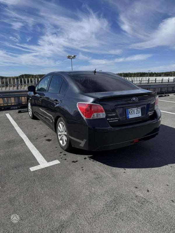 Grey Subaru Impreza 2016 in Vilnius, with an engine capacity of 2.00 L and mileage of 90 thousand km for 7750 €, photo 4 on AUTOMOTO.COM.LV