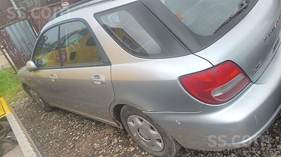 Grey Subaru Impreza 2001 in Daugavpils, with an engine capacity of 1.60 L and mileage of 134 thousand km for 350 €, photo 3 on AUTOMOTO.COM.LV